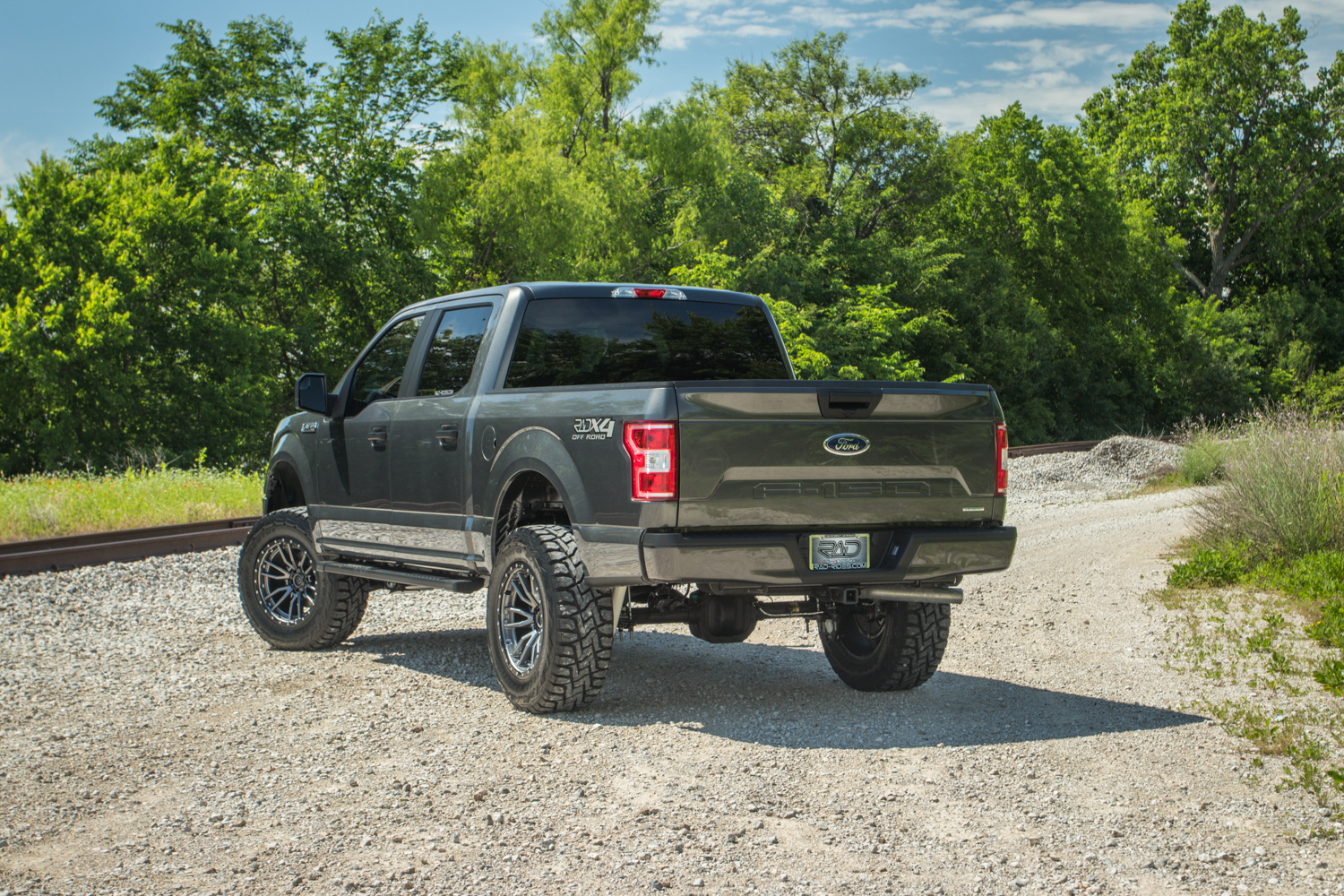 Custom Lifted 4x4 Truck F-150 with Fuel Rebel Wheels