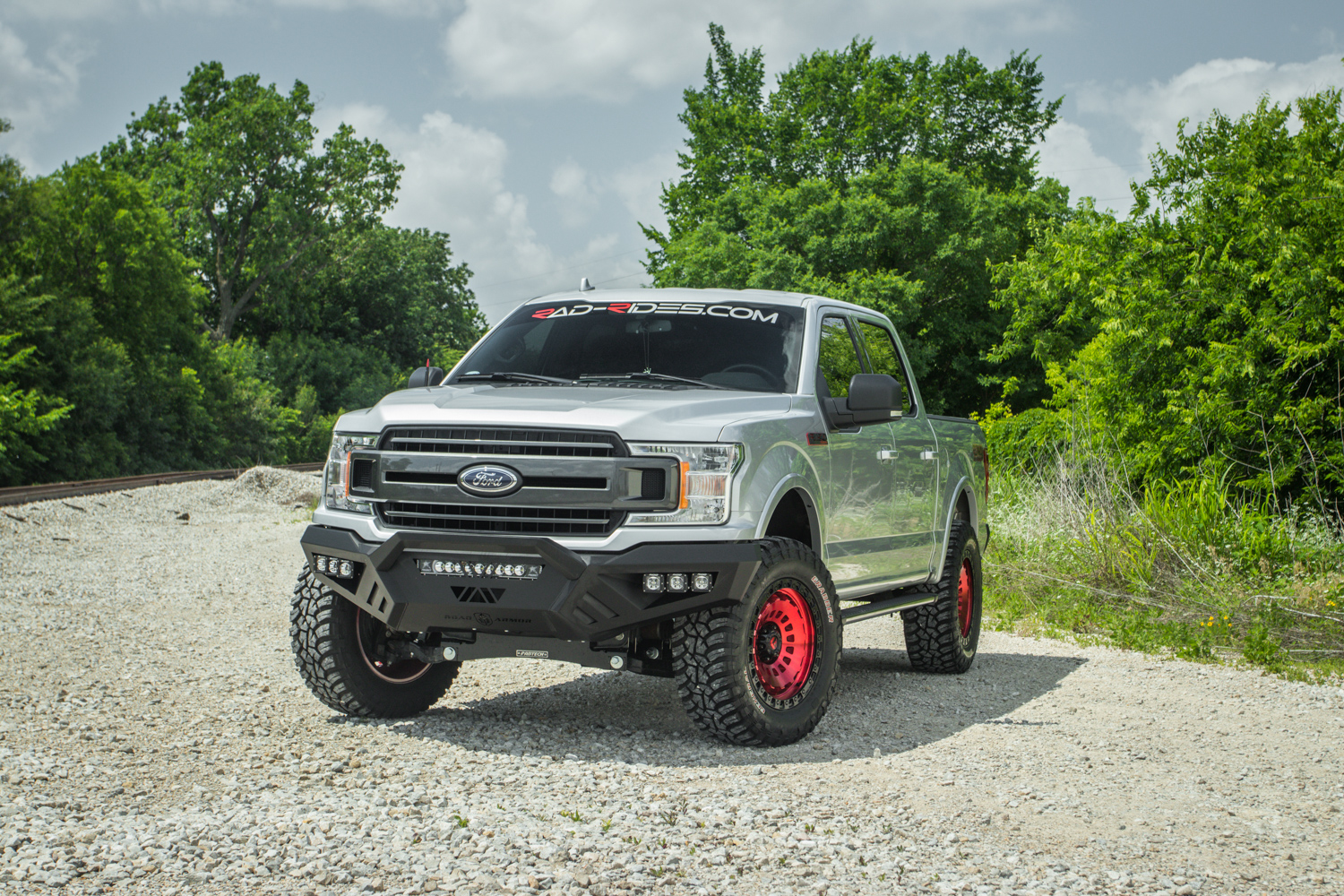 Ford F-150 with Fuel Zephyr Wheels in Red and Road Armor Spartan Bumpers