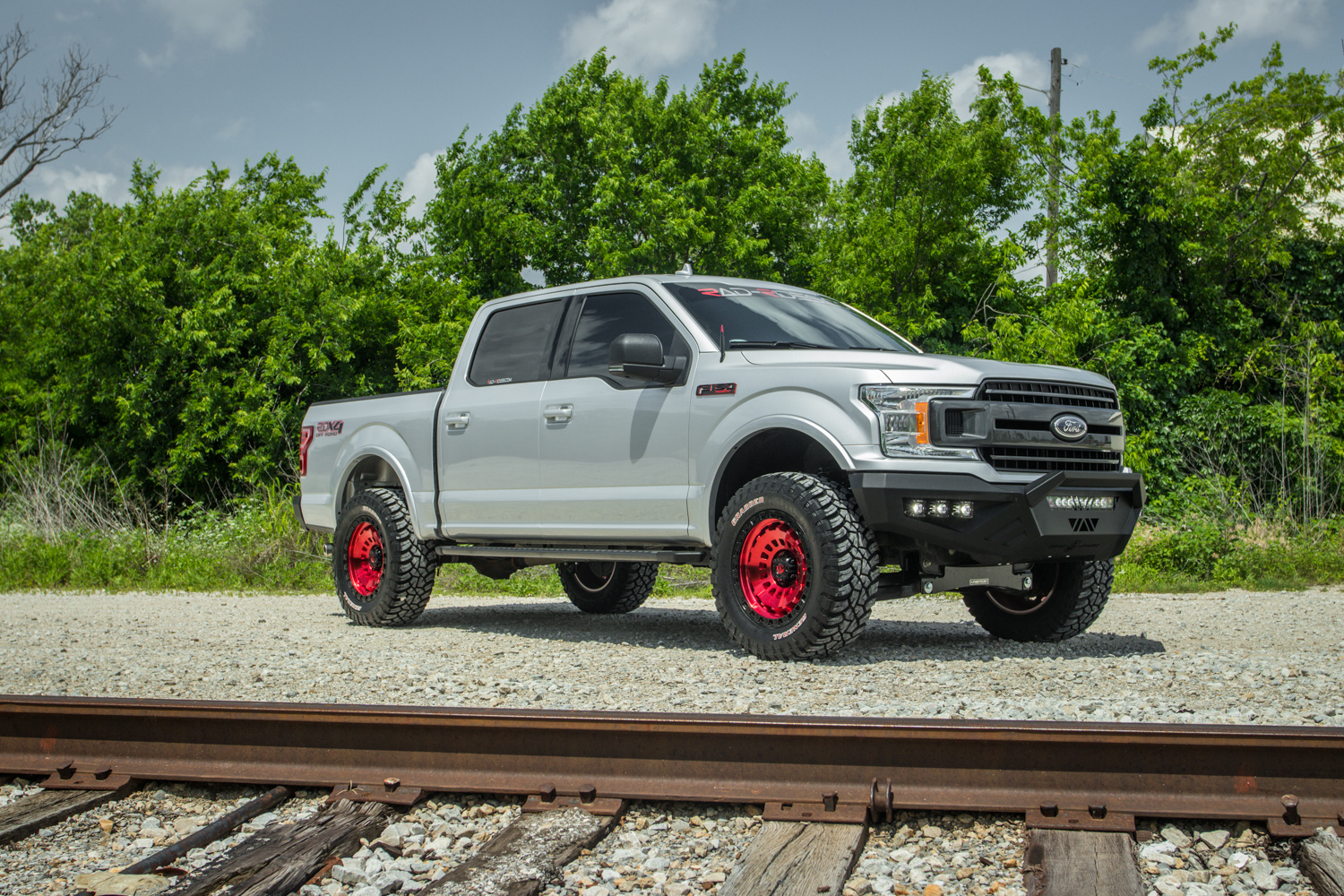 Ford F-150 with Fuel Zephyr Wheels in Red and Road Armor Spartan Bumpers