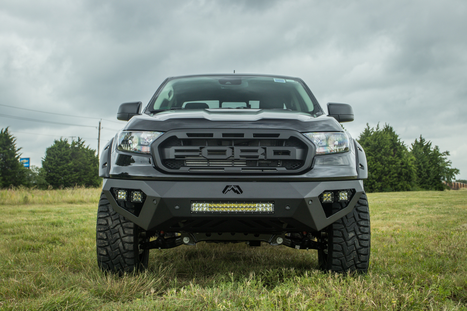 New Ford Ranger 4x4 Lifted with Raptor Style Grill and FabFours Bumper